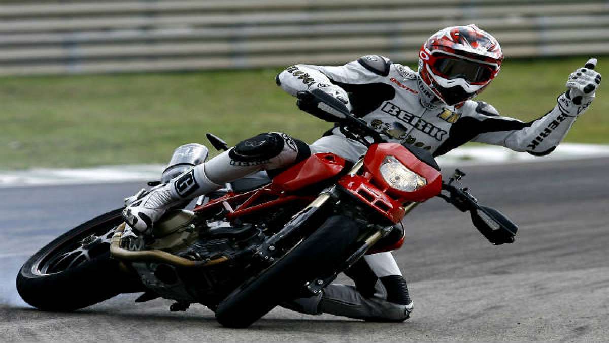 How To Powerslide A Bike - DriveSpark