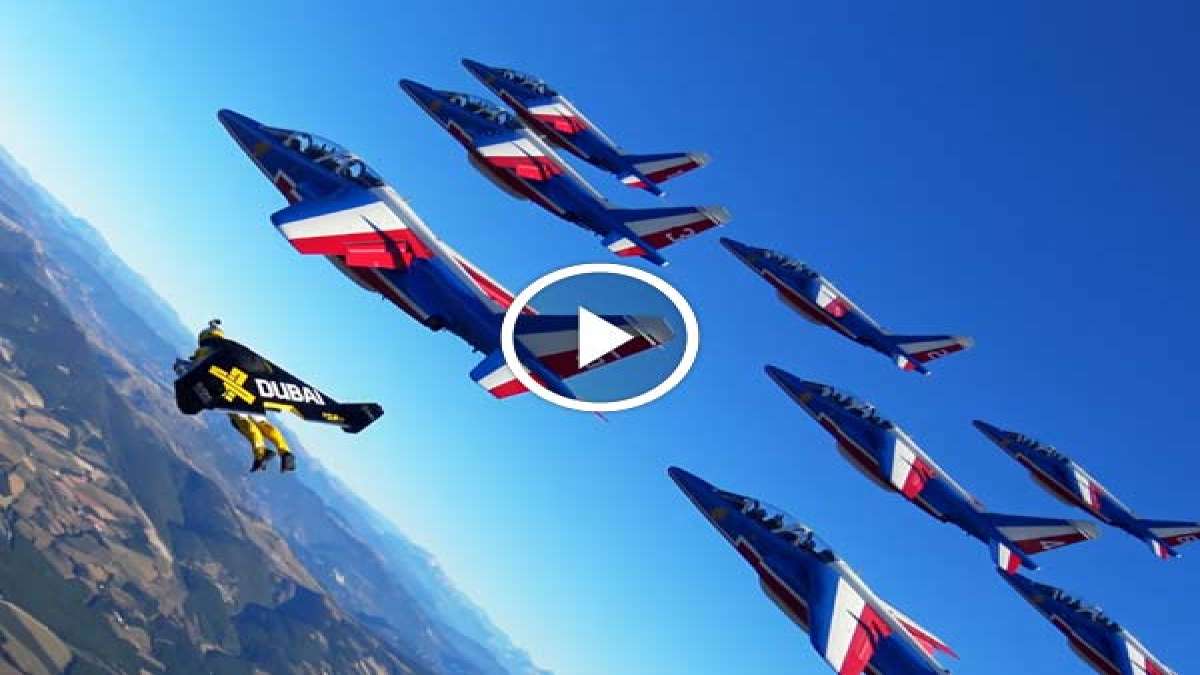 Three Jetmen Fly Alongside The French Air Force's Aerobatic Display ...