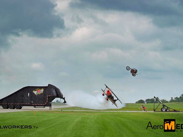 Motocross Rider Jumps Over Biplane At 2014 Cameron Air Show - DriveSpark