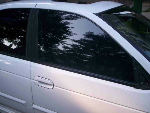 Cars With Tinted Windows Still Thrive - DriveSpark News