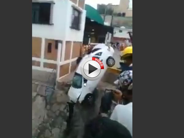 VIdeo: Tow Truck Lifts Car Out Of Ravine And Then Watches It Slide Back ...