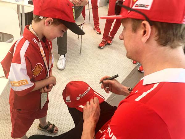 F1 Fan Thomas Danel Meets Kimi Raikkonen - DriveSpark