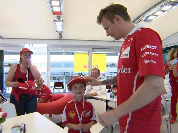 F1 Fan Thomas Danel Meets Kimi Raikkonen - DriveSpark