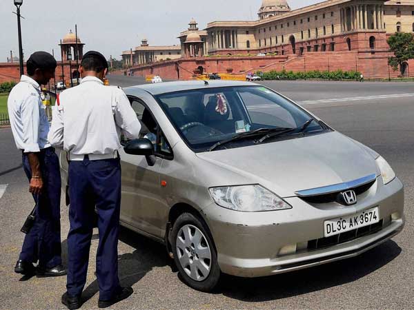 Karnataka MP Driving Innova Crysta Breaks Barricade And Almost Runs ...