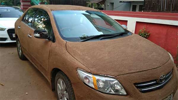 Toyota Corolla Owner Gets Car Wrapped In Cow Dung - DriveSpark News